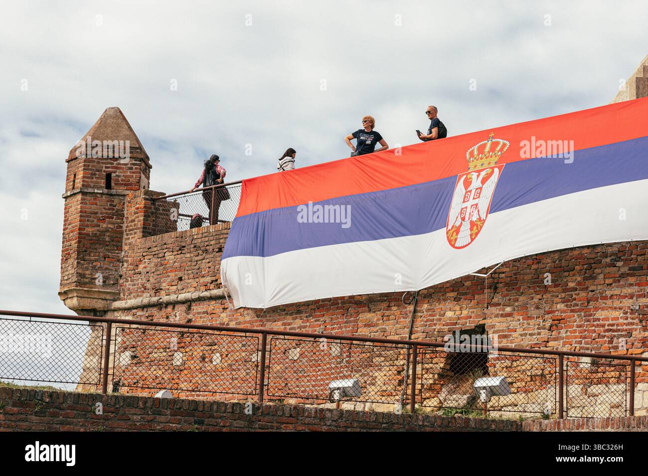 06 April 2024, Belgrade, Serbia: Tourists standing on Fortress walls ...