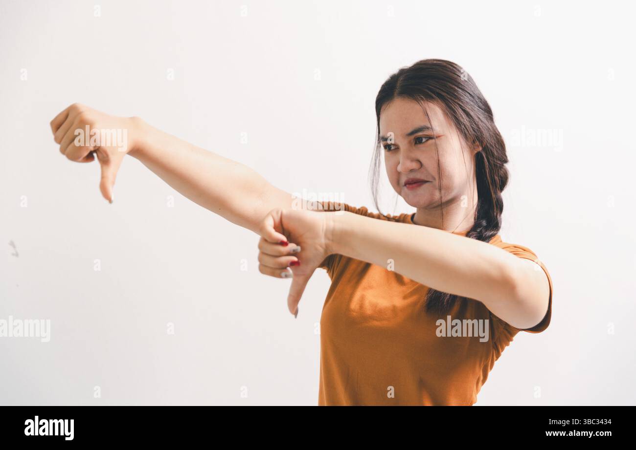 Asian girl expresses dislike, person express negative feeling, concept ...