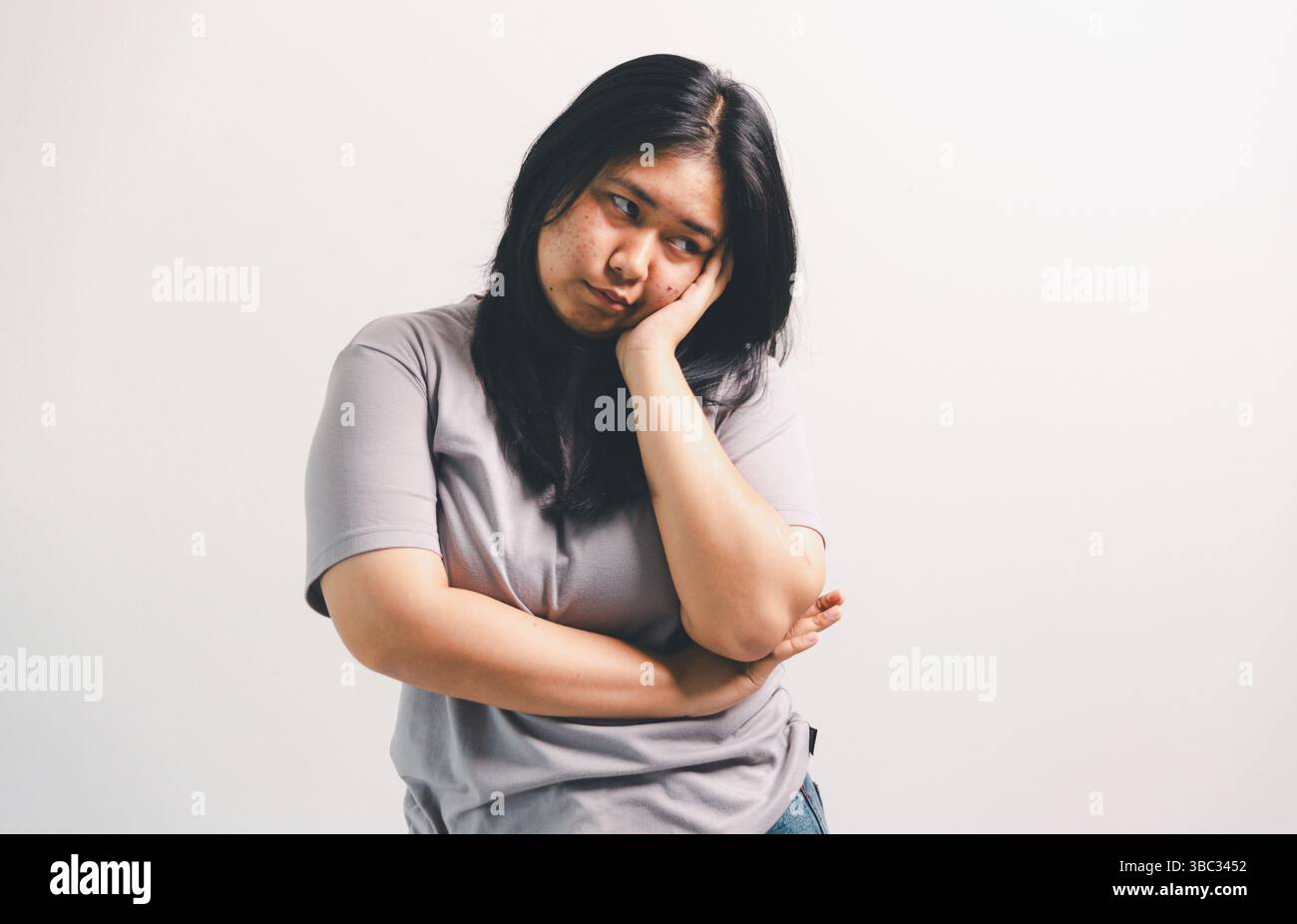 Asian girl expresses dislike, person express negative feeling, concept ...