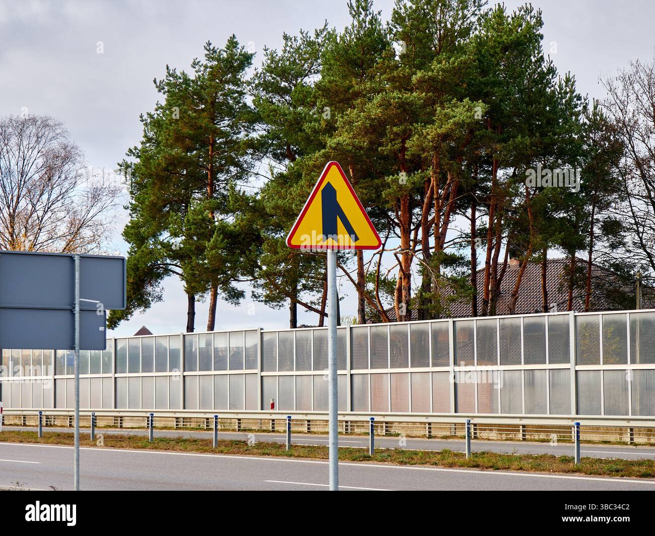 Road Sign Warning of Merging Traffic Ahead Stock Photo - Alamy