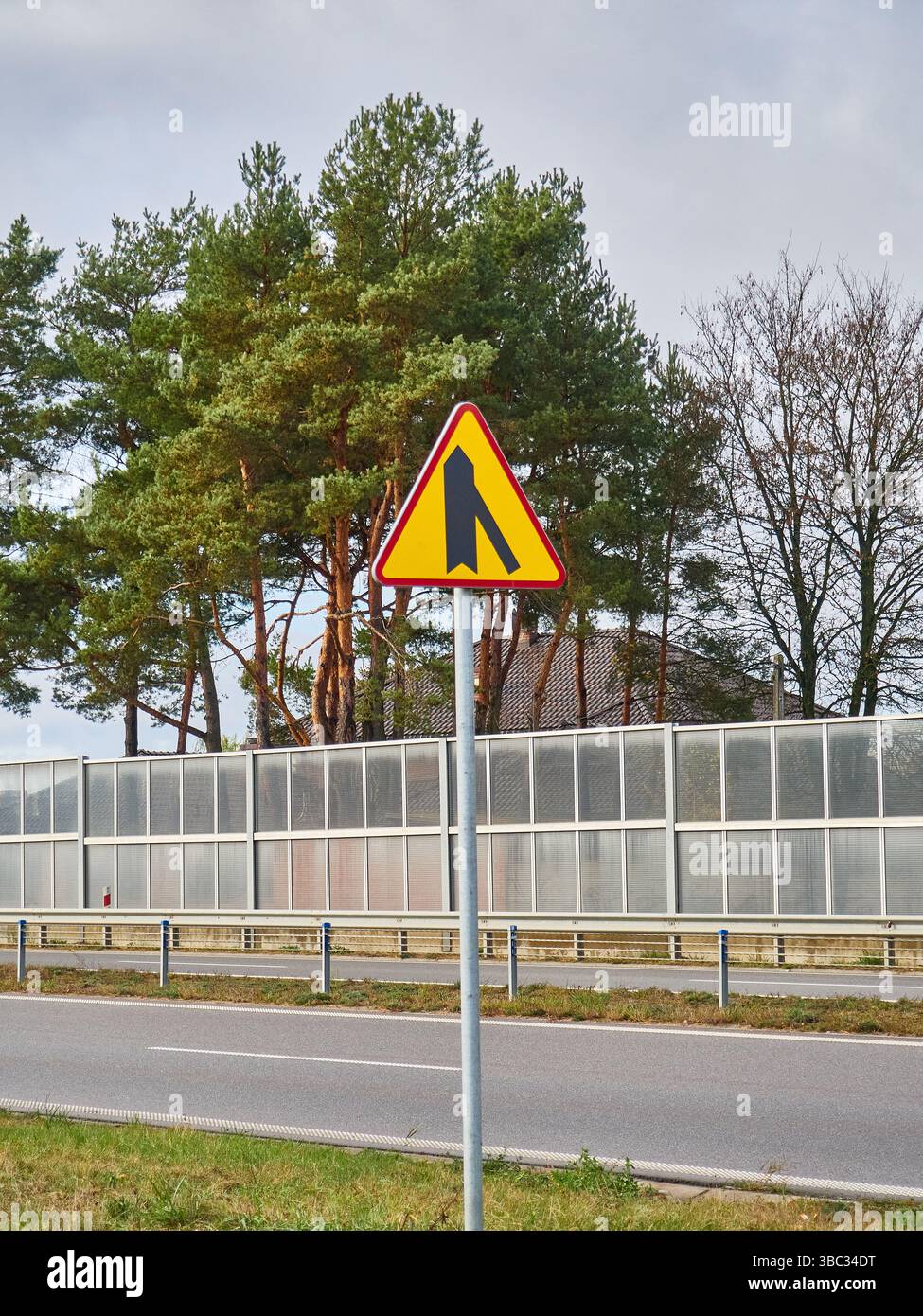 Road Sign Warning of Merging Traffic Ahead Stock Photo - Alamy