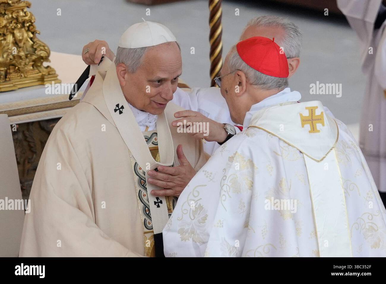 Pope Leo XIV receives the pallium, or lambswool stole, a symbol of the ...