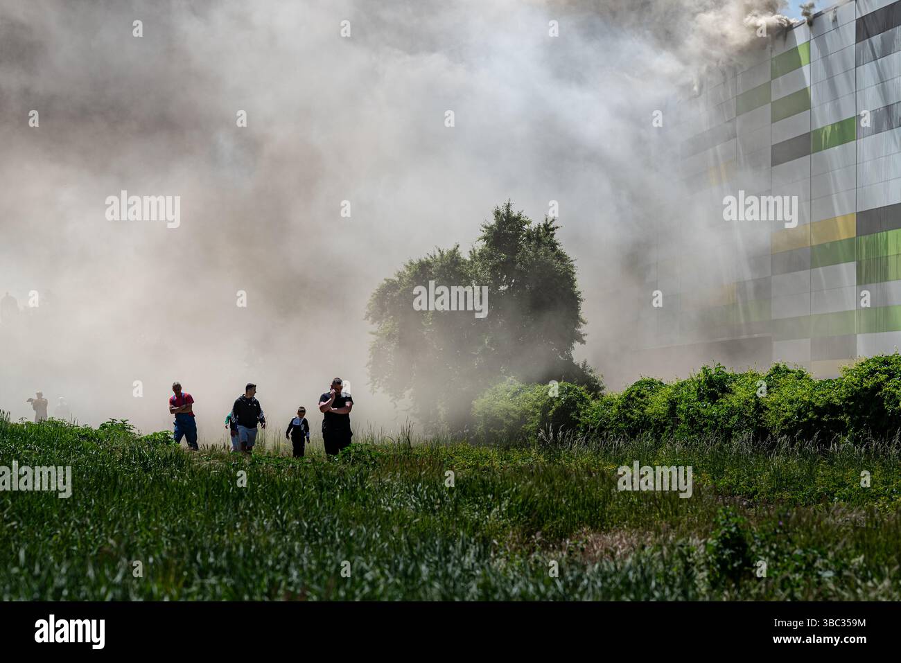 People watching massive fire and flames in a mall Stock Photo - Alamy