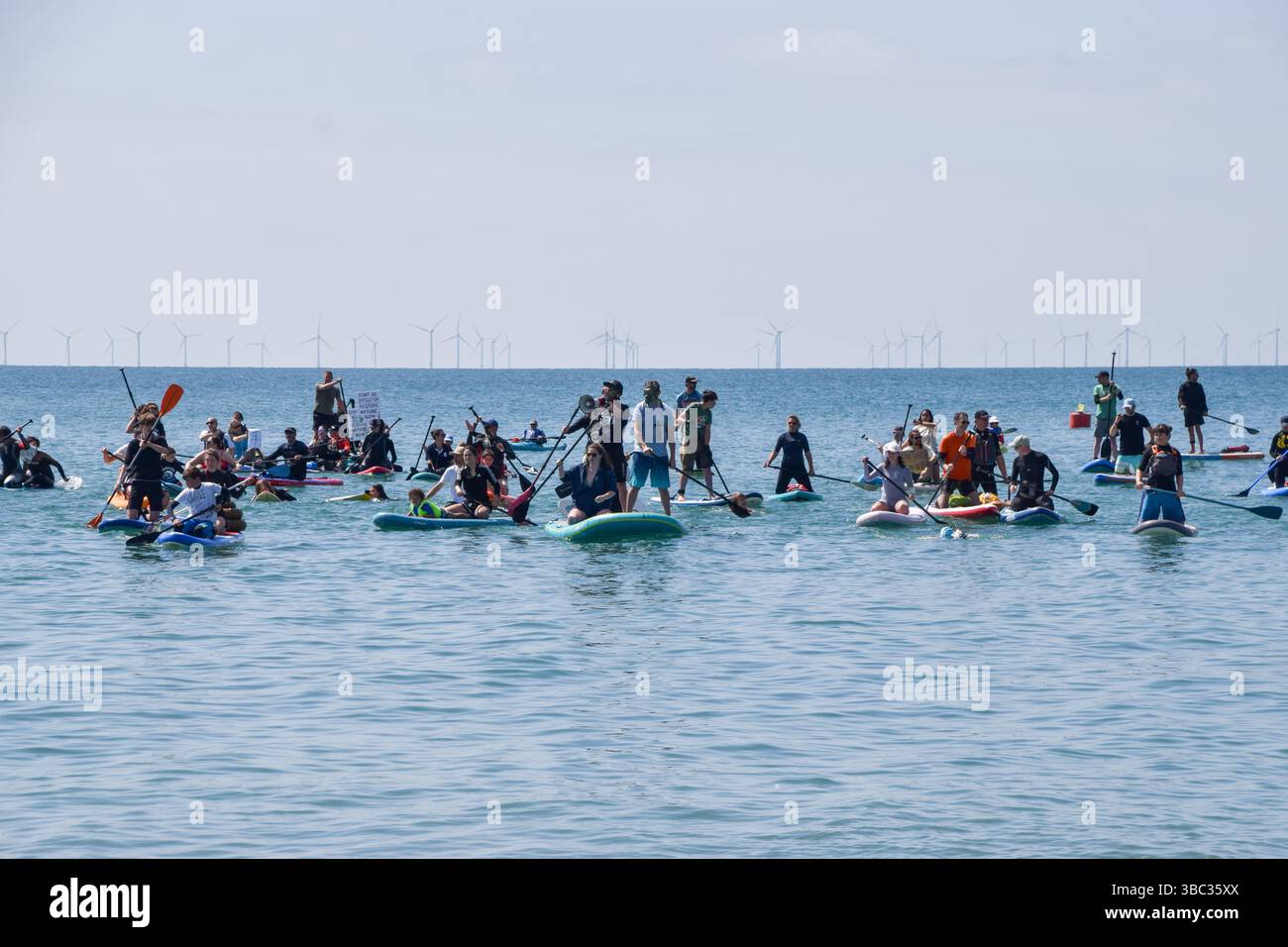 Brighton, UK. 17th May 2025. Protesters on paddle boards stage a ...