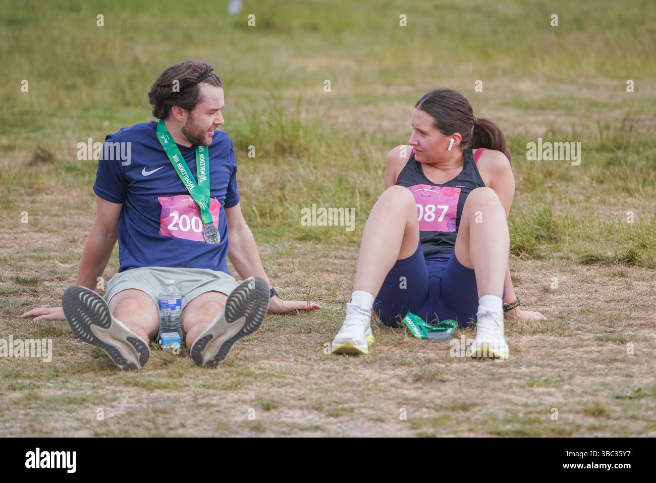 London, UK. 18 May 2025. Participants with their finish medals after ...