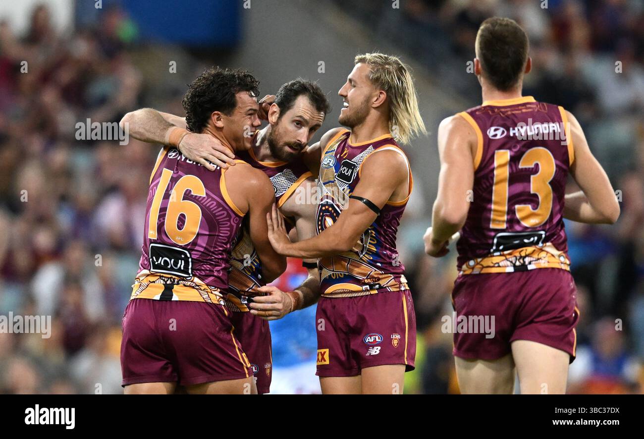 Brisbane, Australia. 18th May, 2025. Darcy Gardiner (centre) of the ...