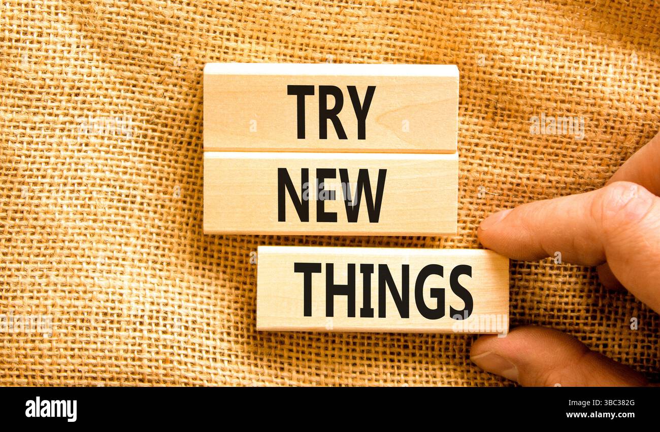 Try new things symbol. Concept words Try new things on beautiful wooden ...