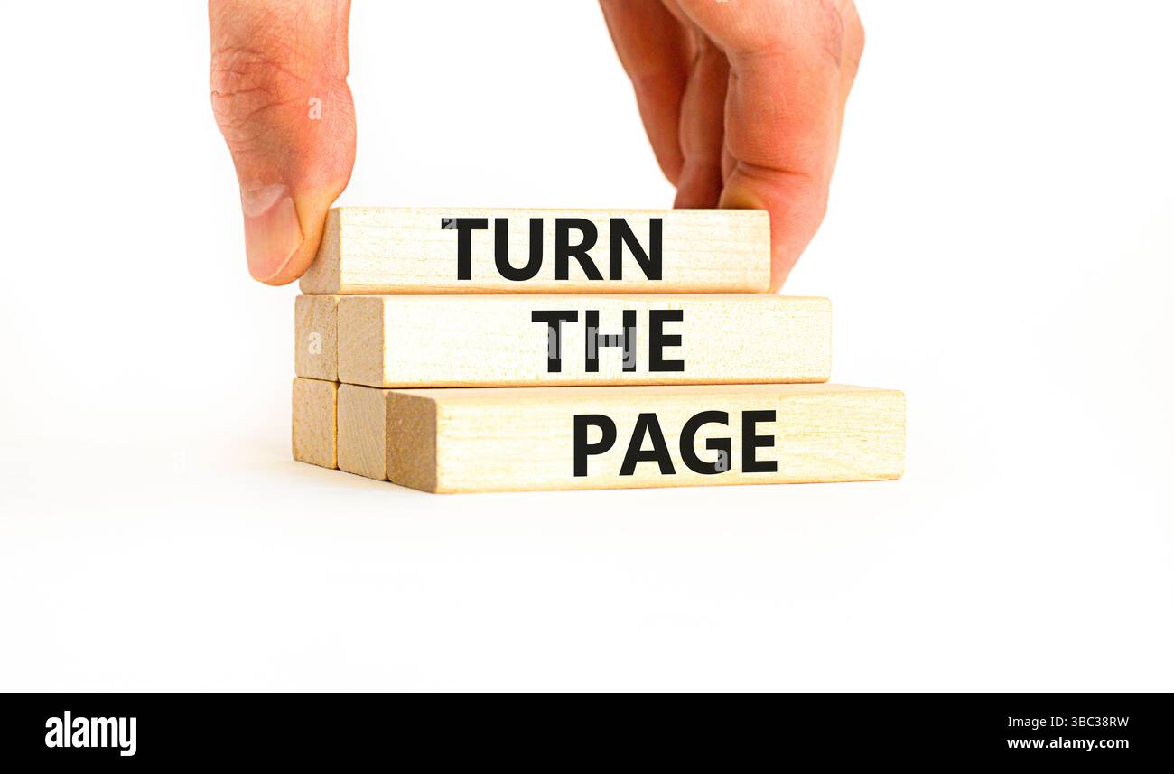Turn the page symbol. Concept words Turn the page on beautiful wooden ...
