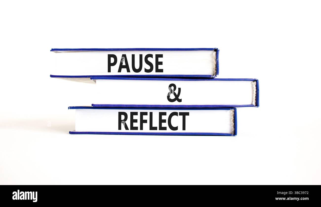 Pause and reflect symbol. Concept words Pause and reflect on beautiful books. Beautiful white ...