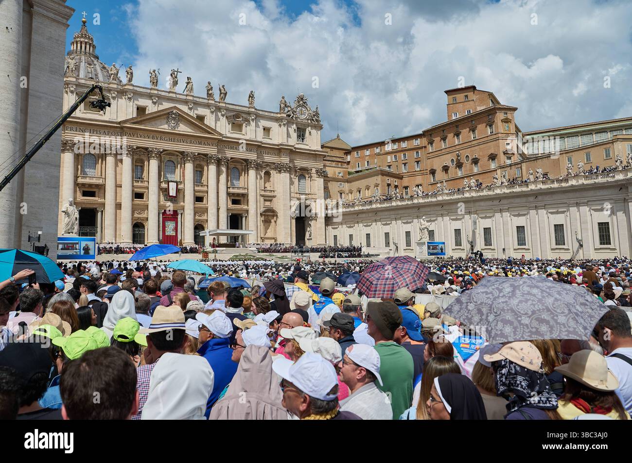 Worshippers attend the Inauguration Mass of Pope Leo XIV at St Peters ...