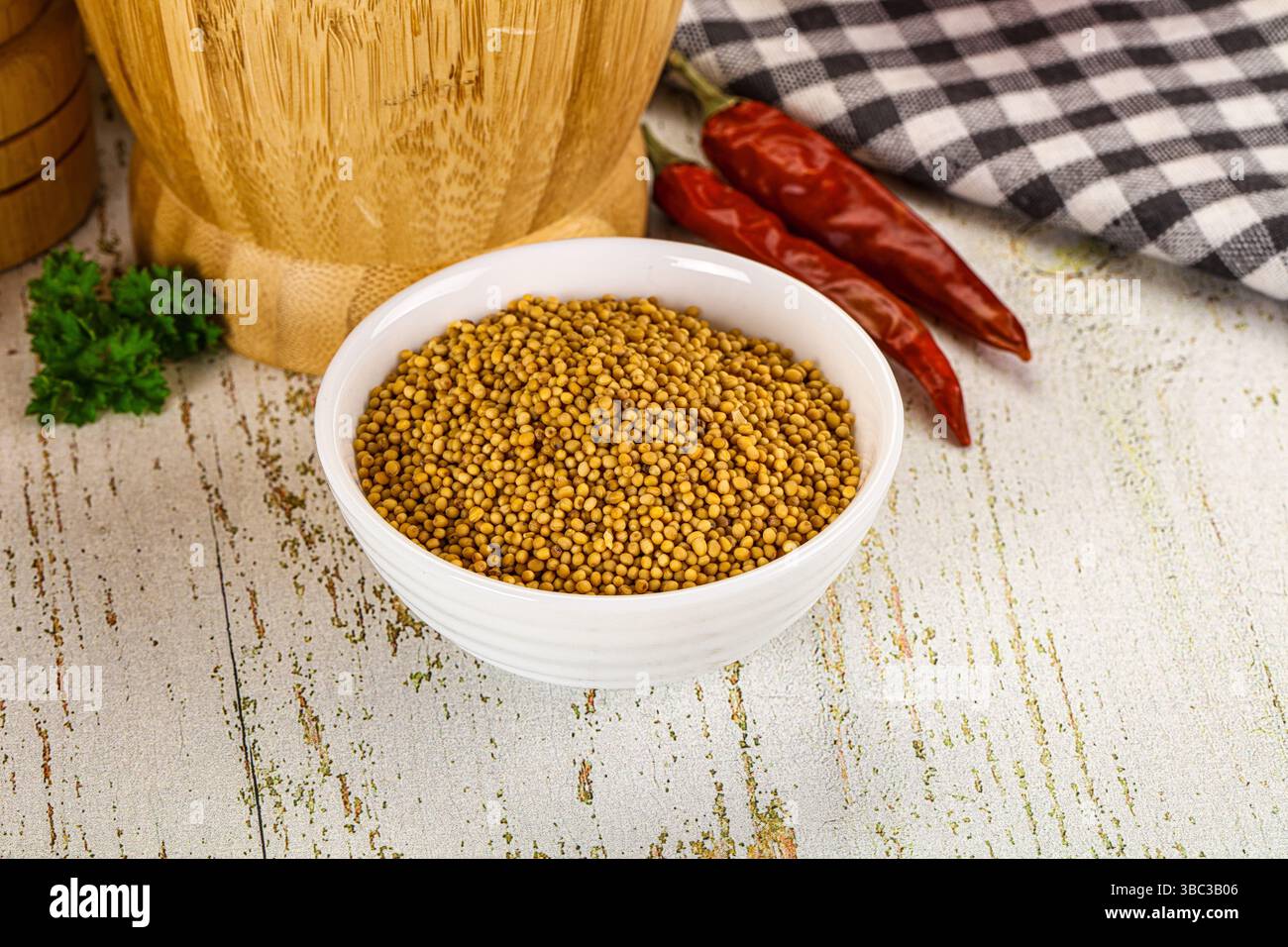 Dry mustard seeds in the bowl for culinary Stock Photo - Alamy