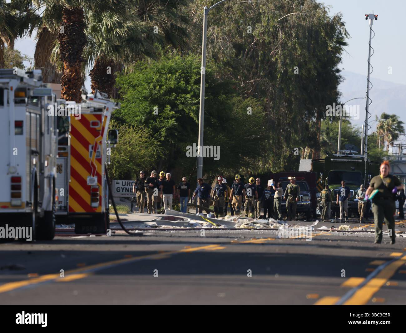 Palm Springs, USA. 17th May, 2025. Authorities investigate near the site of an explosion in Palm ...