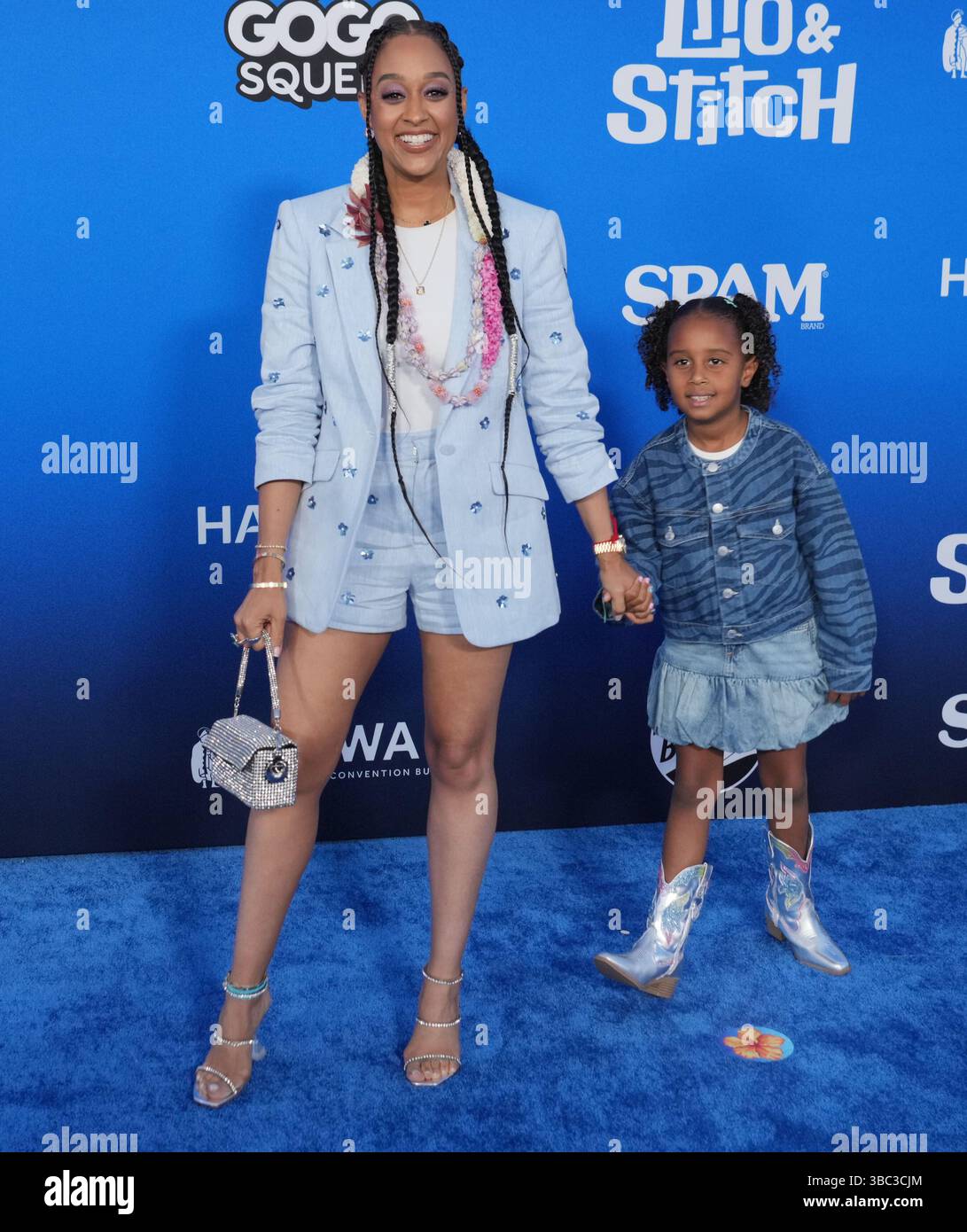 (L-R) Tia Mowry and Cairo Tiahna Hardrict arrives at the Disney's LILO ...