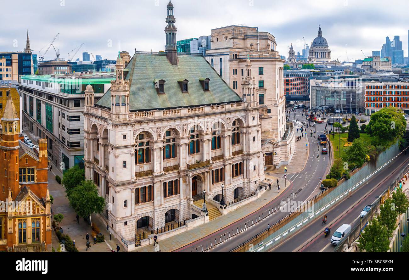 Elevated view of ornate historic building by Blackfriars Bridge, busy ...