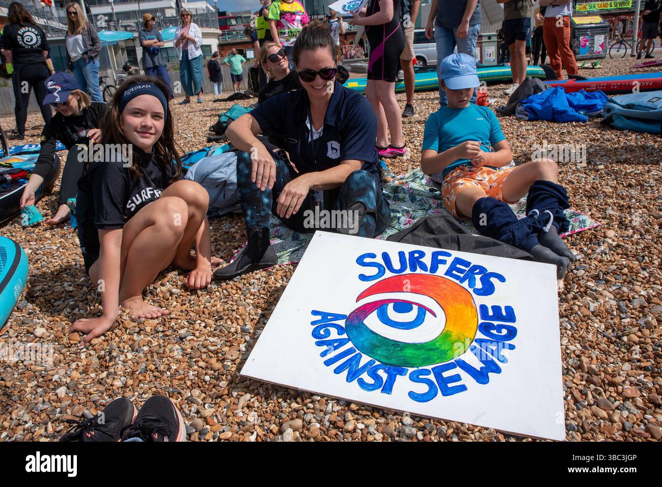 Brighton, UK. 17th May, 2025. Protesters prepare themselves during the ...