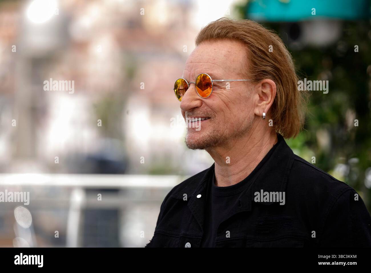 Bono poses at the photocall of 'Bono Stories of Surrender' during the ...