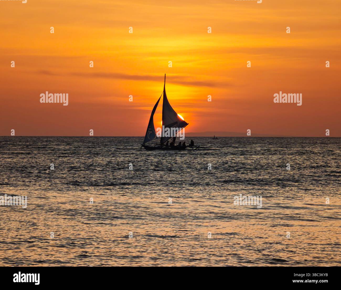 Boracay island sunset view with sailboat in horizon. Amazing topical ...