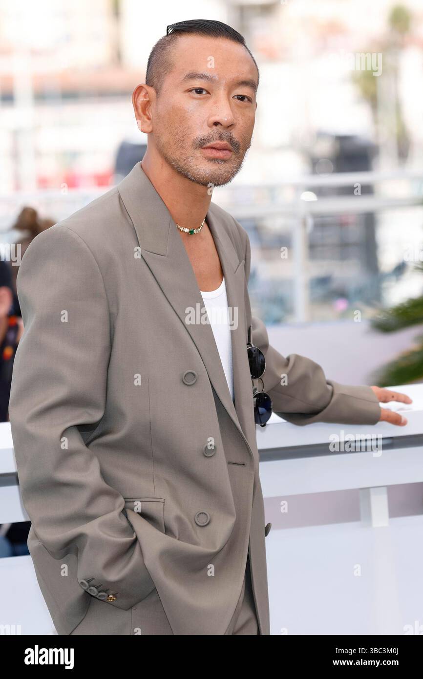Juno Mak poses at the photocall of 'Sons Of The Neon Night' during the ...