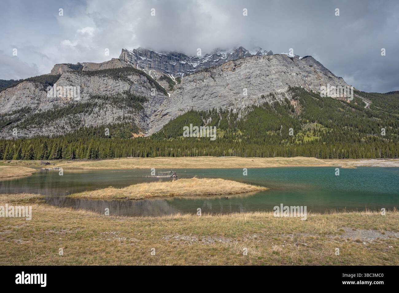 Rain clouds surrounding Cascade Mountain and Cascade River in Banff ...