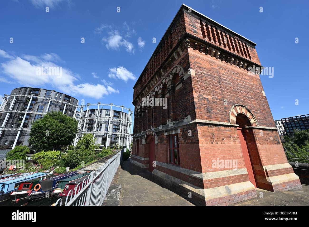 St Pancras Waterpoint water tower with Gasholder Park and St Pancras ...
