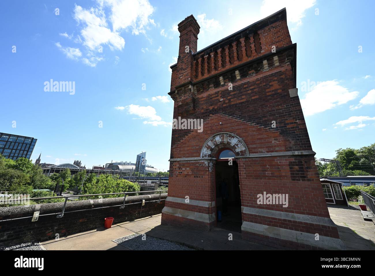 St Pancras Waterpoint water tower with St Pancras International train ...