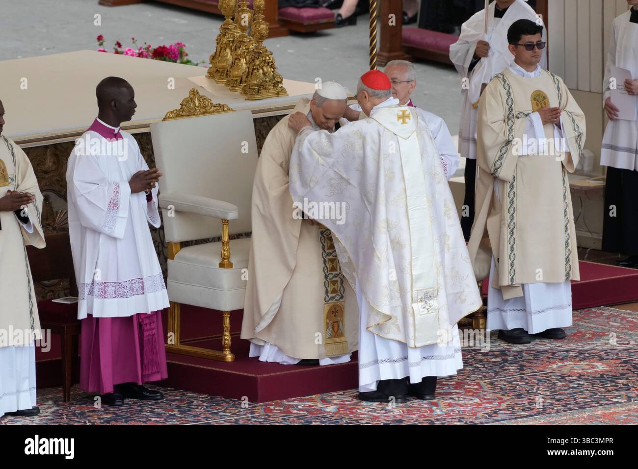 Pope Leo XIV receives the pallium, or lambswool stole, a symbol of the ...