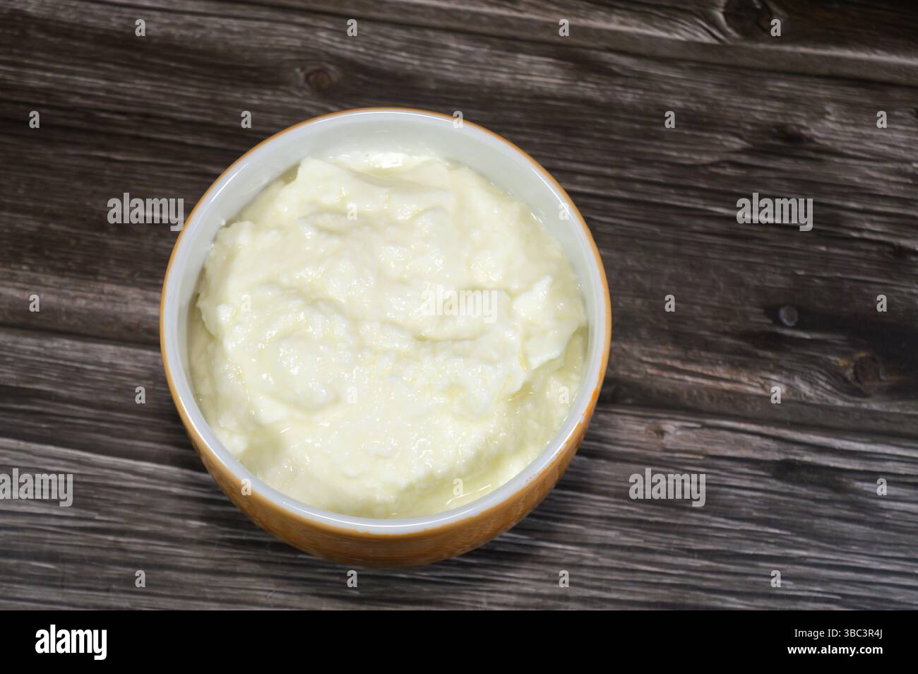 Natural Yogurt, a food produced by bacterial fermentation of milk ...