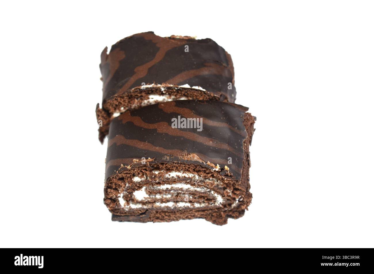 chocolate rolled cake filled with cream and coated with cocoa, jelly ...