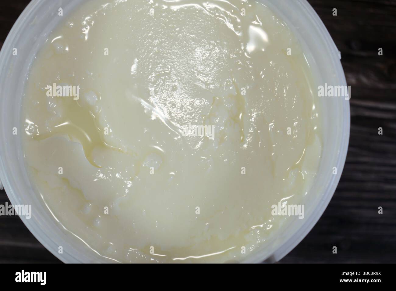 Natural Yogurt, a food produced by bacterial fermentation of milk ...