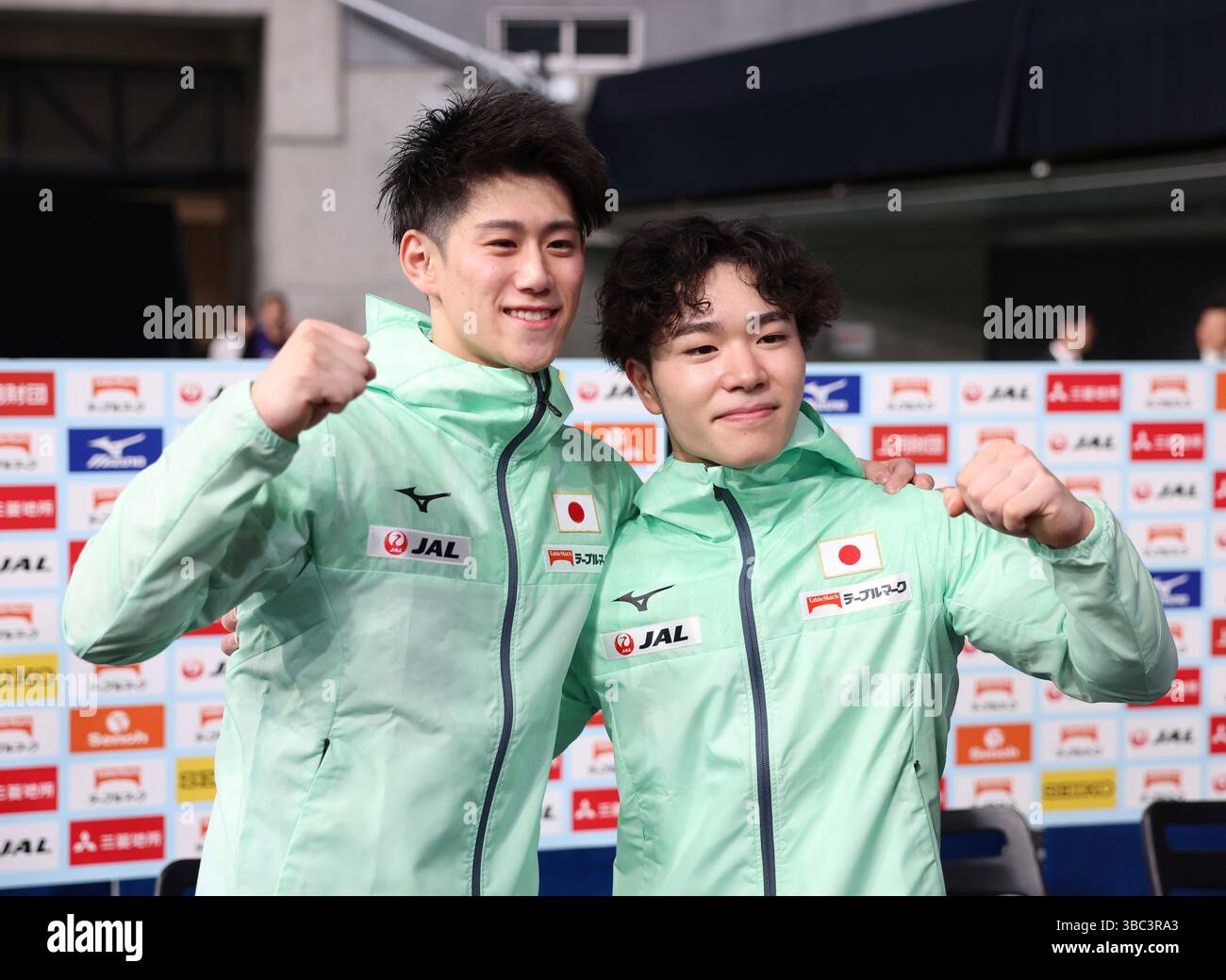 Shinnosuke Oka (R) and Daiki Hashimoto, of Japan, pose for commomerative photos after the awards ...