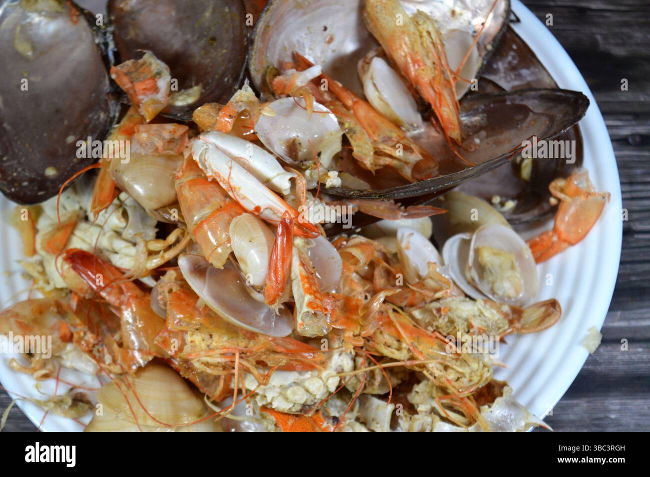 The waste and remains of seafood of shrimps, mussels, fresh crabs, fish ...