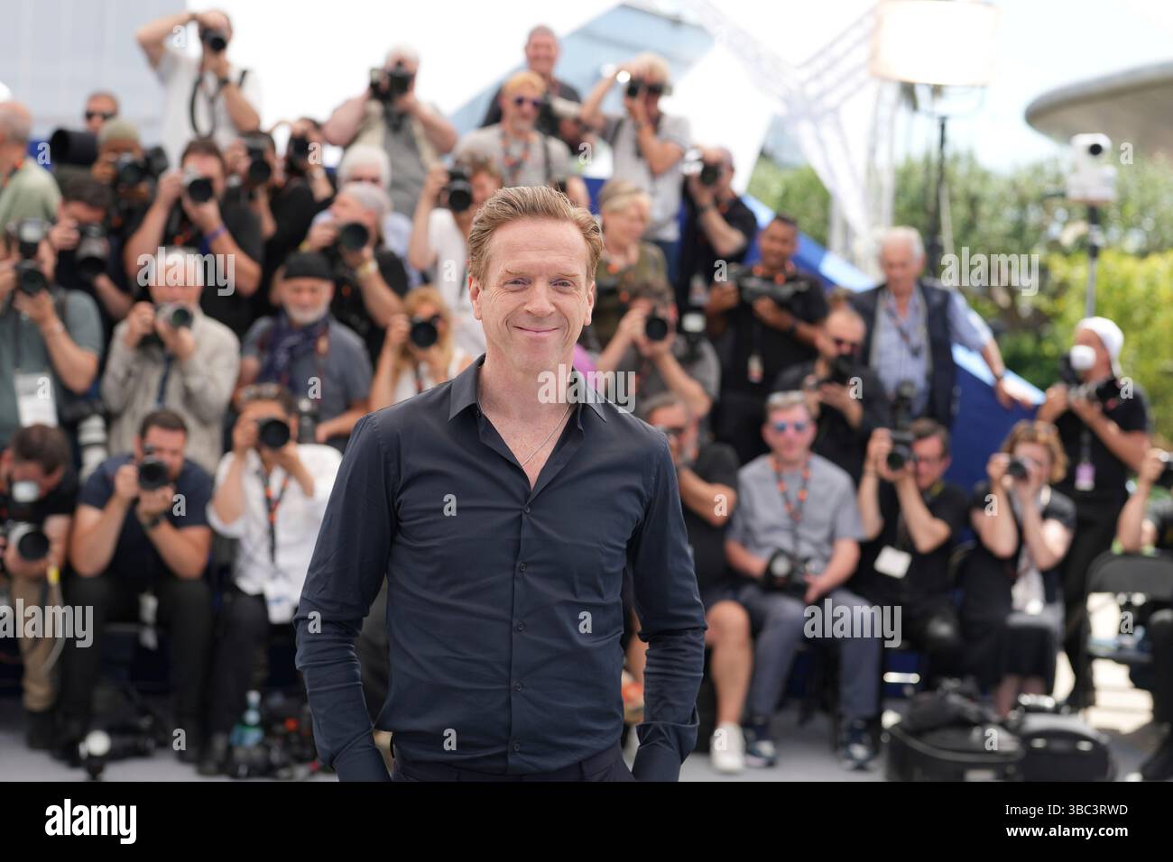 Damian Lewis poses for photographers at the photo call for the film ...