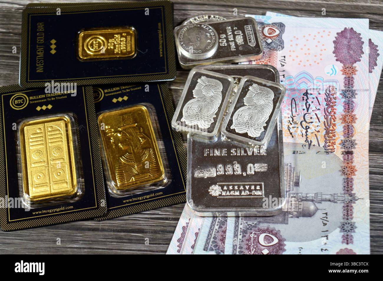 Cairo, Egypt, May 2 2025: Egypt pounds banknotes and BTC Bullion ...