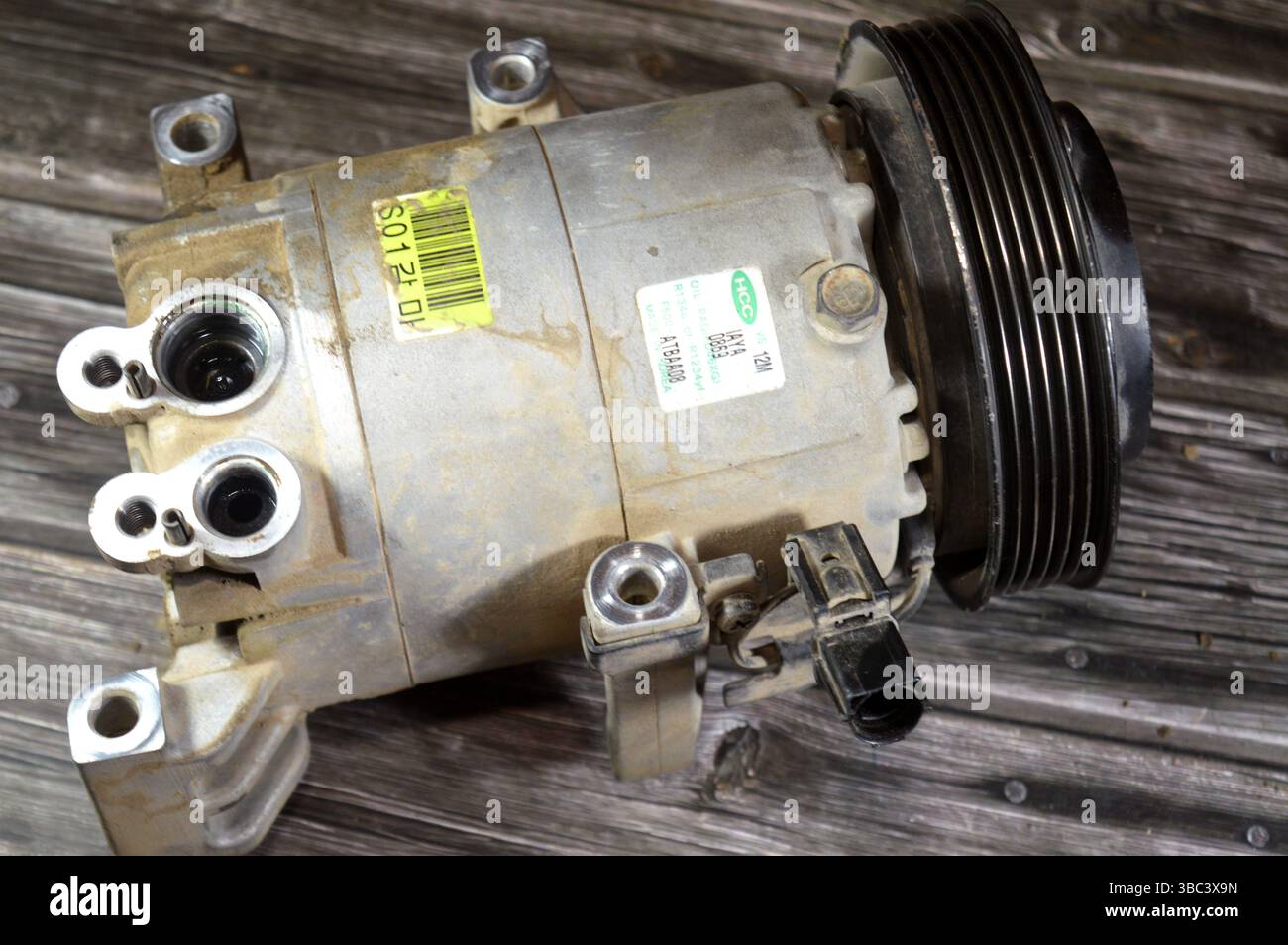 Cairo, Egypt, May 10 2025: Old Hanon car compressor, The compressor is ...