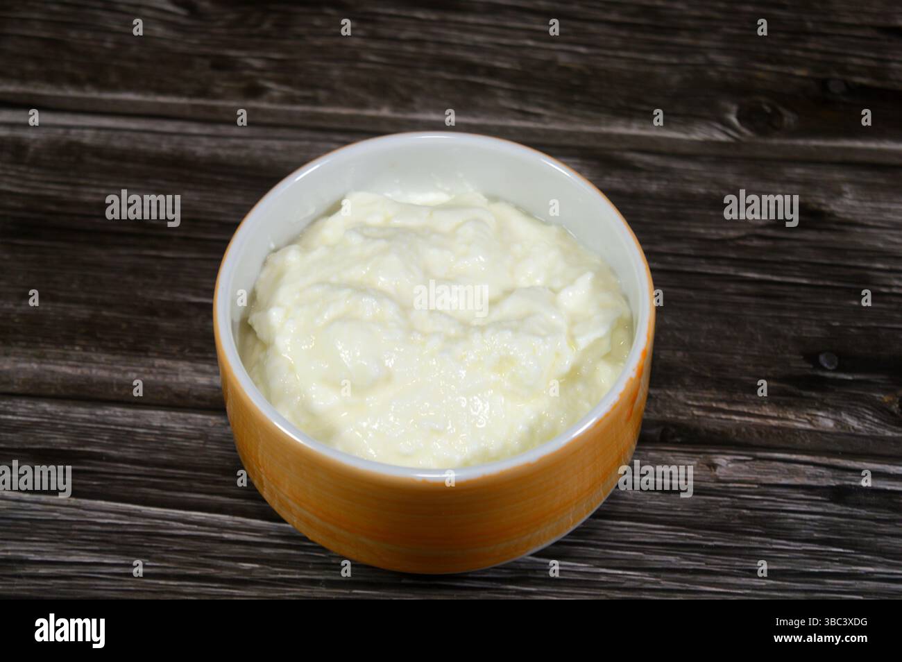 Natural Yogurt, a food produced by bacterial fermentation of milk ...