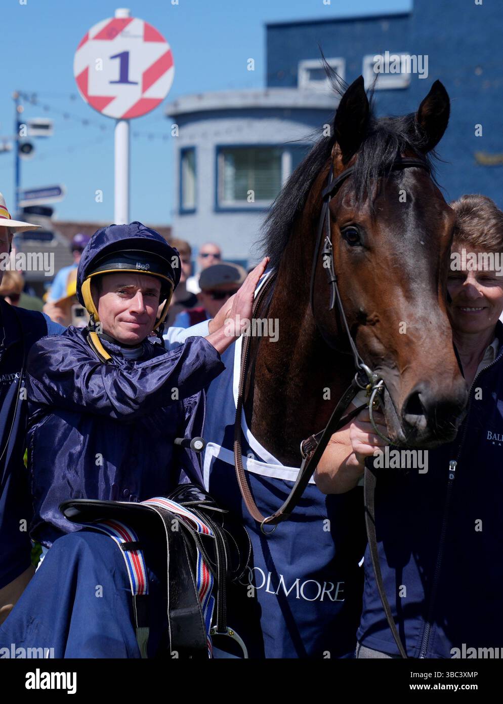 Jockey Ryan Moore with Charles Darwin after winning the Coolmore Stud ...