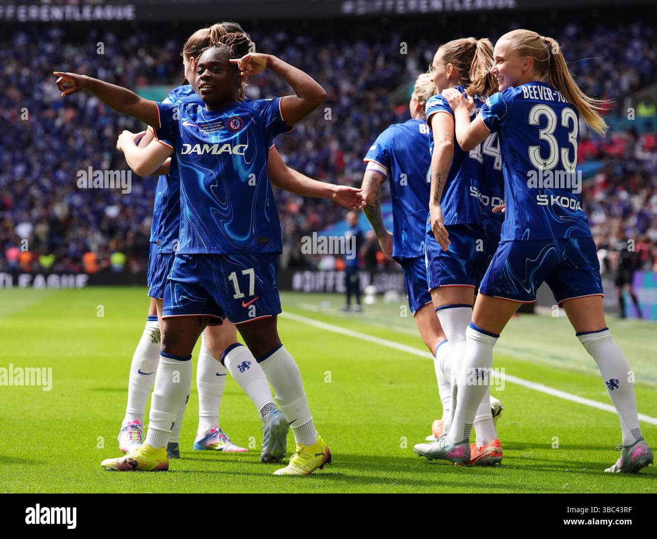 Chelsea's Sandy Baltimore (left) celebrates with team-mates after ...