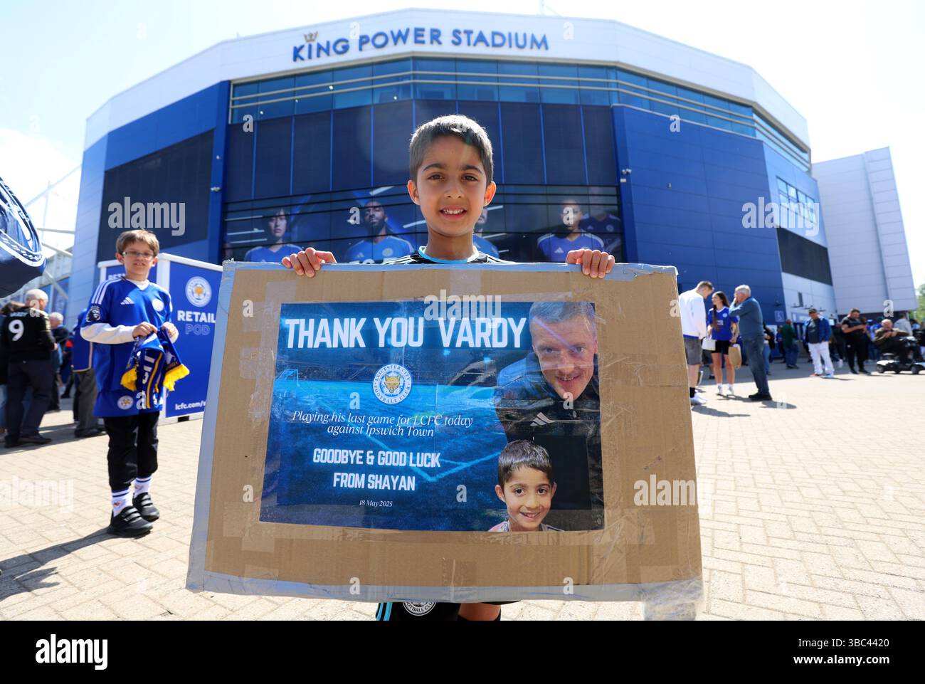 A Leicester City fan Shayan holds up his sign for Jamie Vardy outside ...