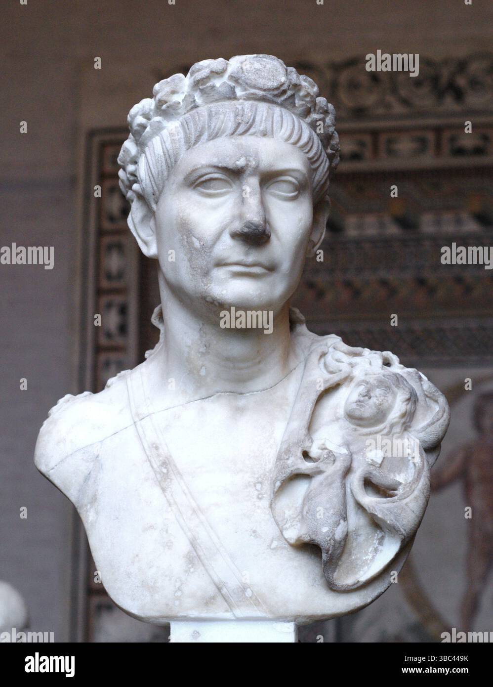 Bust of Trajan (reign 98–117 CE), with the Civic Crown, a sword belt ...