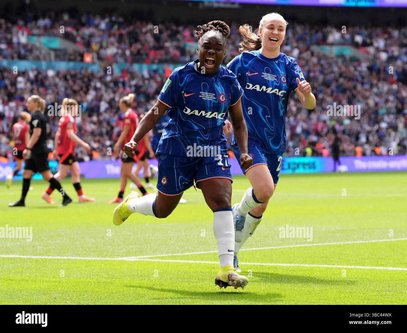 Chelsea's Sandy Baltimore (left) celebrates scoring their side's first ...