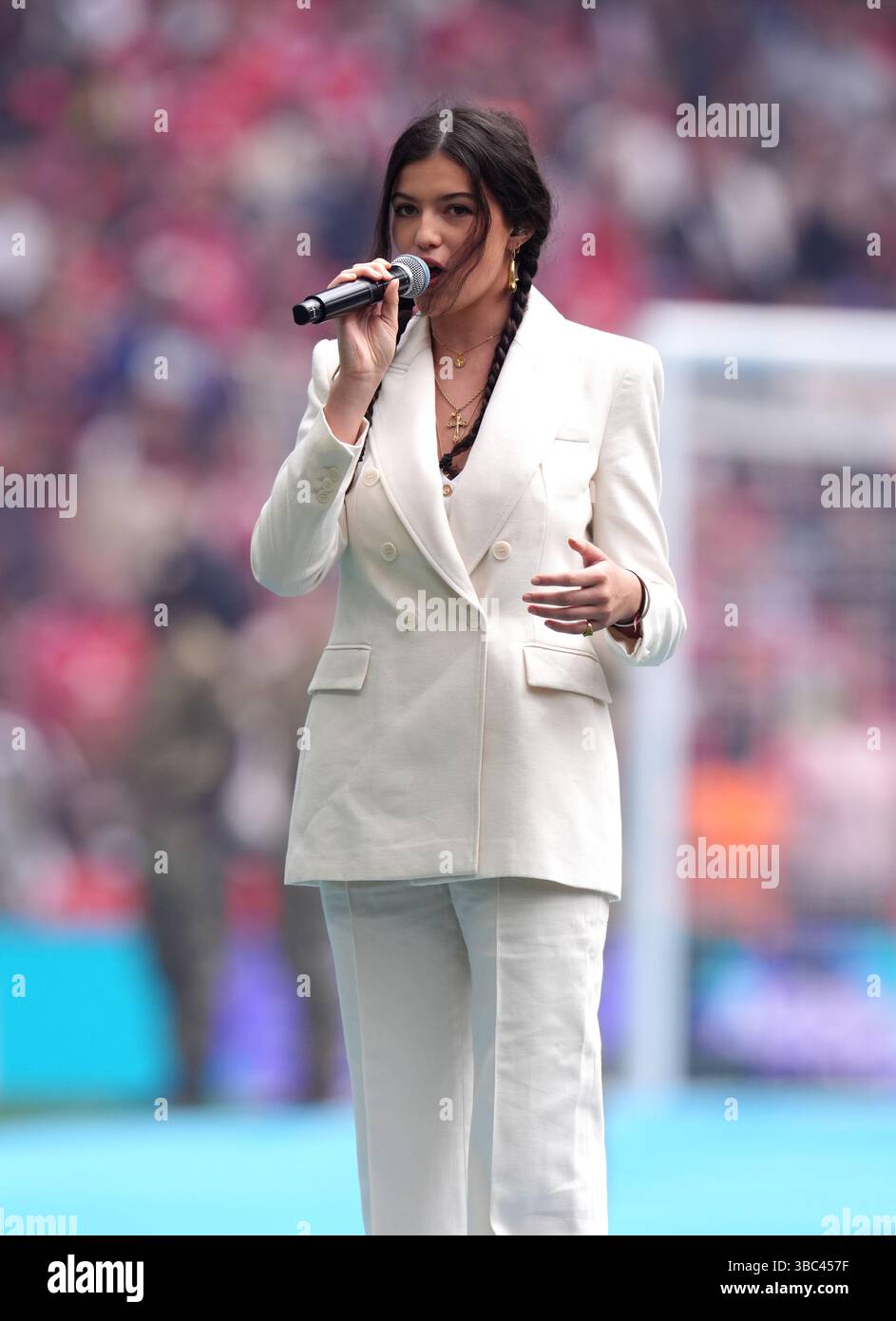 Singer-songwriter Siena MBC performs the National Anthem before the ...