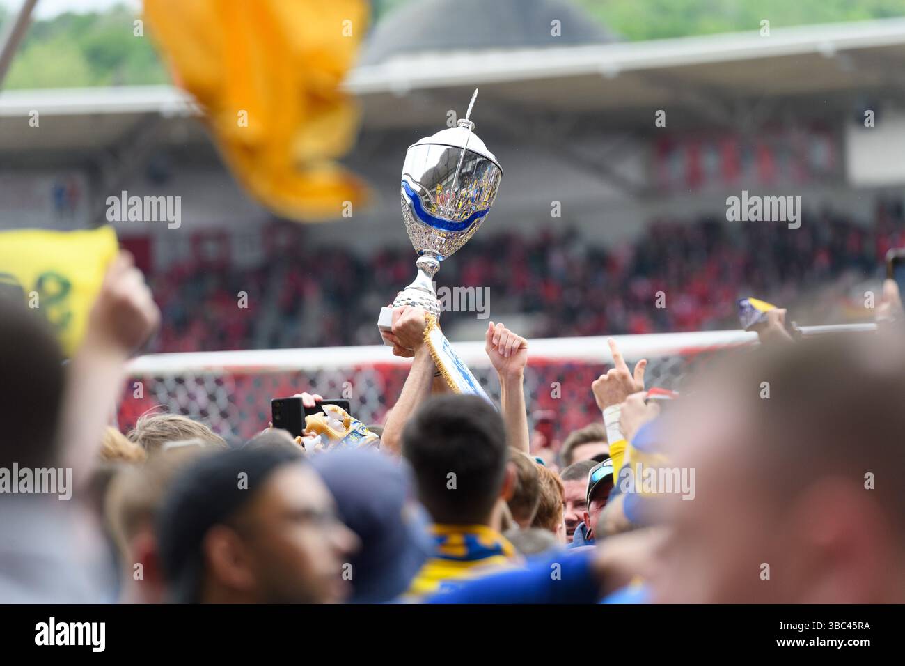 Players and fans of Lokomotive Leipzig celebrating after with the ...