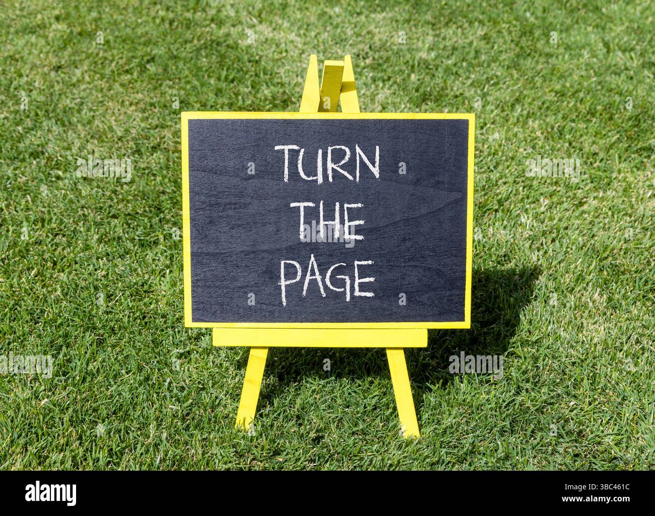 Turn the page symbol. Concept words Turn the page on beautiful yellow ...
