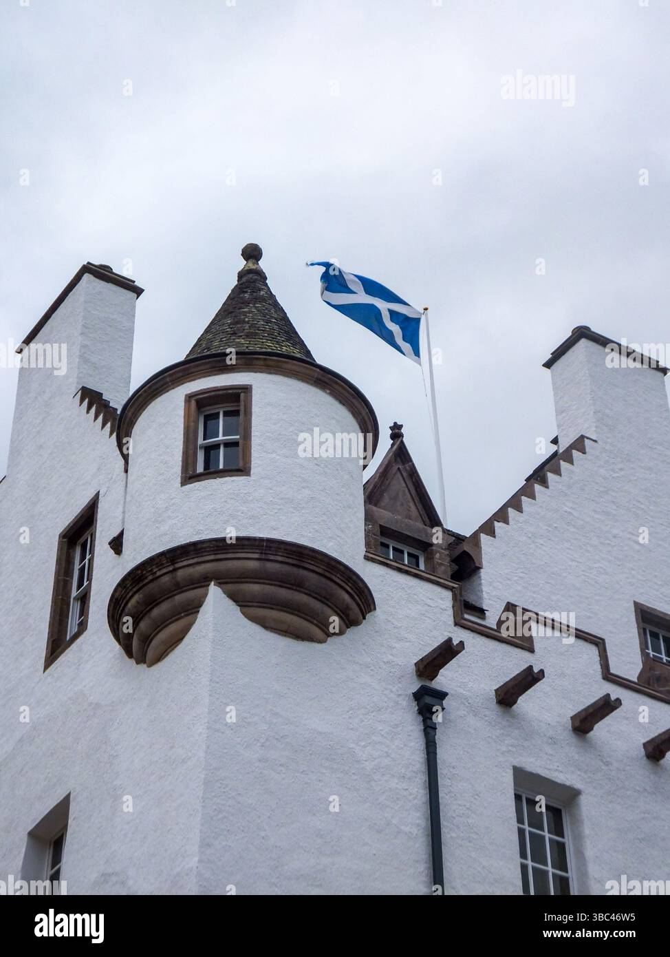 The Scottish flag flies above the corner turret of Blair Castle in ...