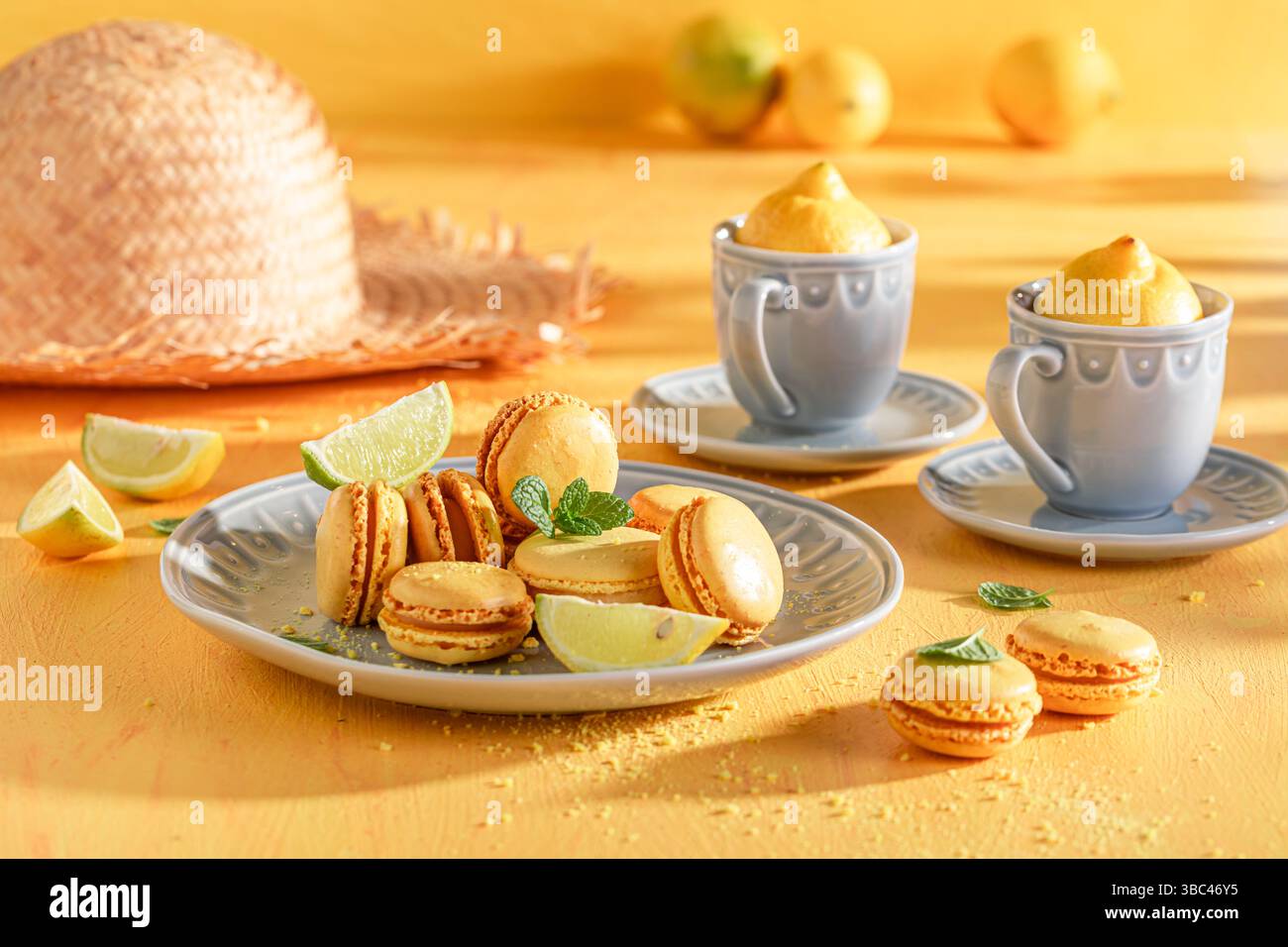 Sour and sweet lemon macarons made of juicy fruit. Sour macarons made ...