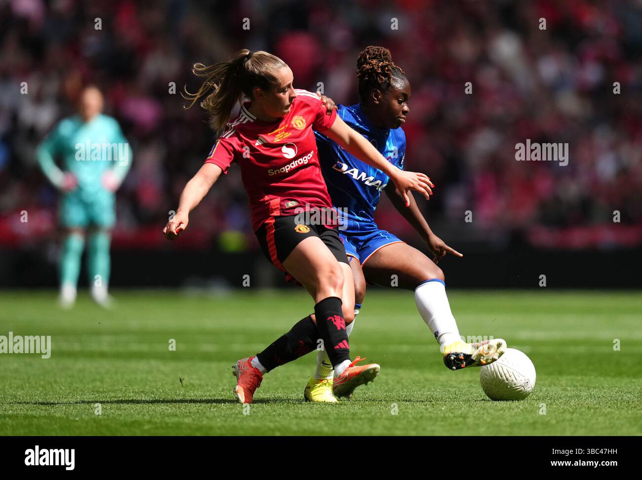 Chelsea's Sandy Baltimore (right) and Manchester United's Ella Toone ...