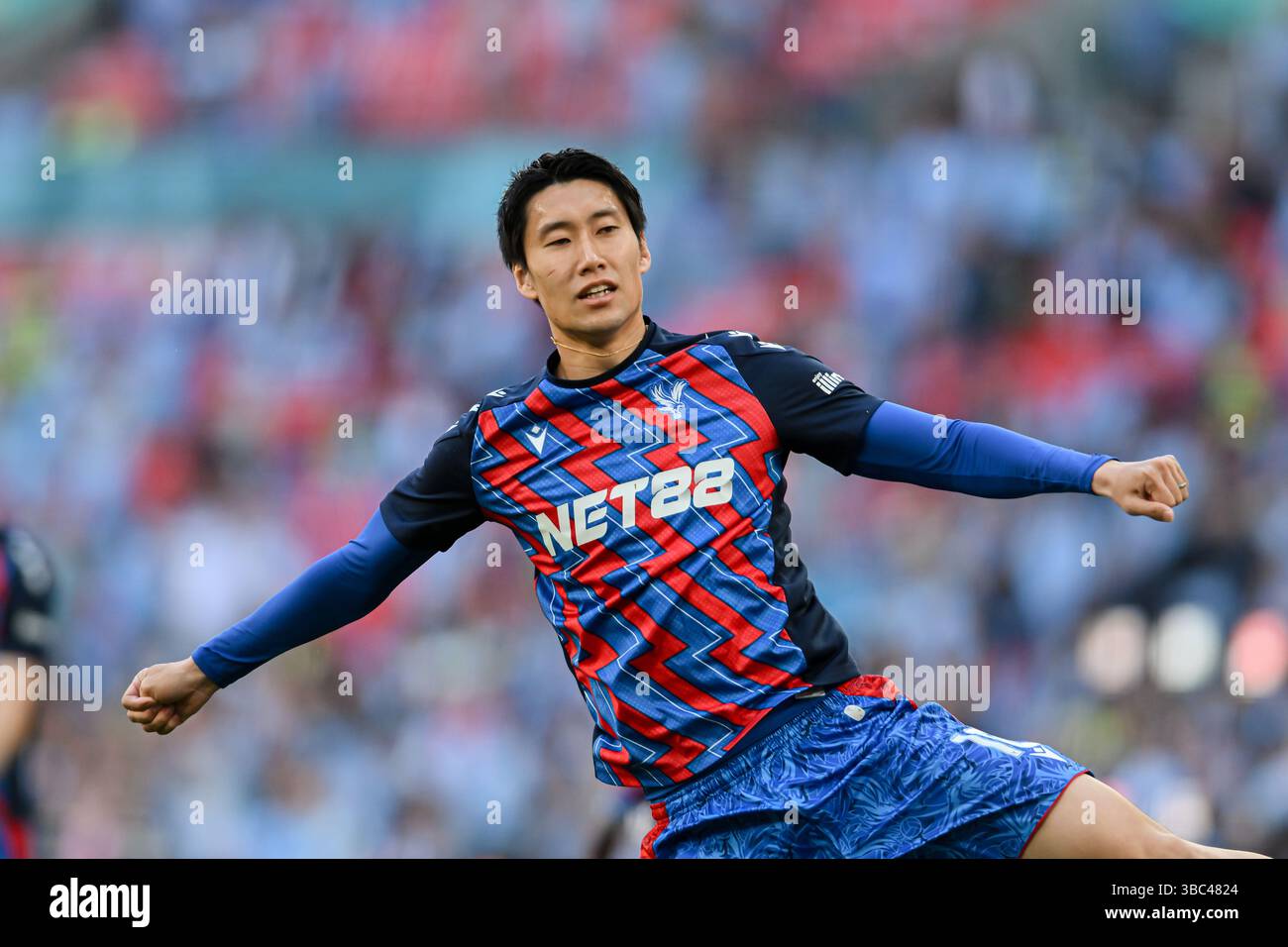 London, UK. 17th May 2025. Daichi Kamada (18 Crystal Palace) warms up ...