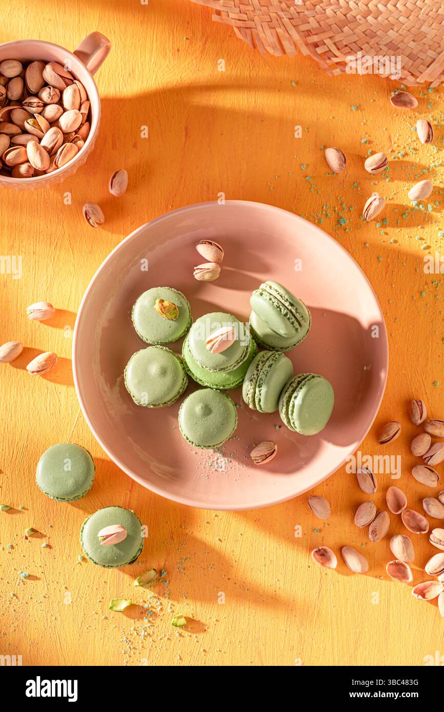 Sweet and creamy pistachio macarons with mix of nuts. Sweet macarons ...