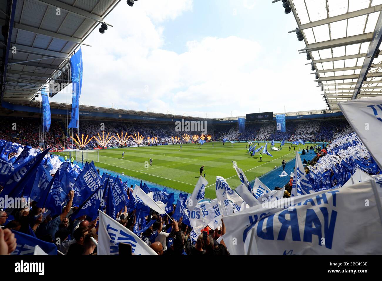 Pyrotechnics are set off and fans wave flags as the teams make their ...