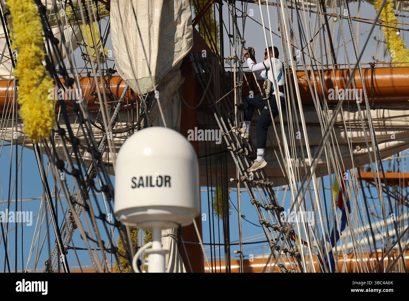 While docked at Pier 35, Sunday, May 18, 2025 in New York, a sailor ...